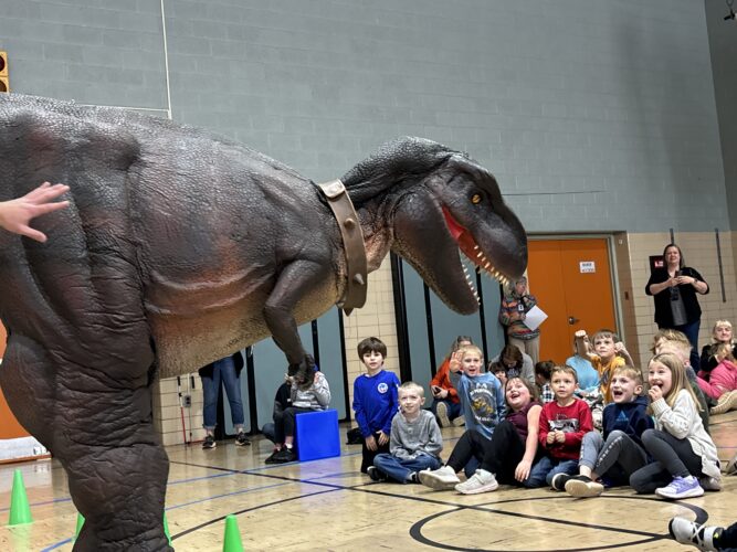 Dinosaurs roam at Phillips Elementary literacy event | News, Sports ...